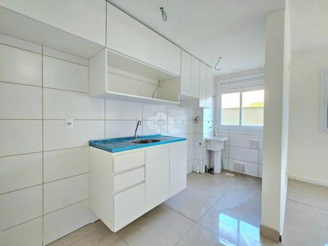 Apartamento de 2 dormitórios e 1 vaga de garagem no bairro Estancia Velha em Canoas