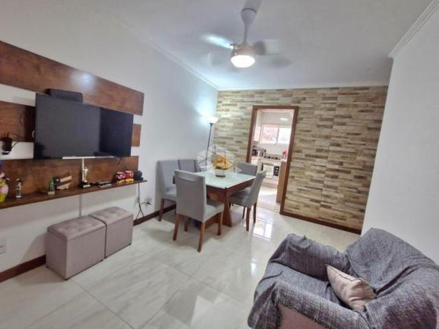 Apartamento de 2 dormitórios e 1 vaga de garagem, no bairro Humaitá, em Porto Alegre