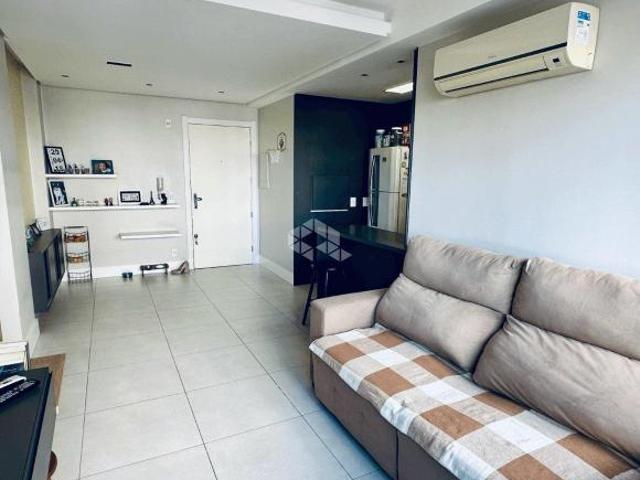 Apartamento de 2 dormitórios e 1 vaga de garagem no bairro São Sebastião