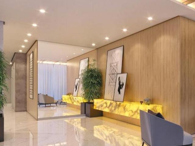 Apartamento de 2 dormitórios e 2 vagas de garagem a 50 metros do mar em Praia Grande SP
