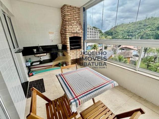 Apartamento de 2 dormitórios e varanda gourmet à venda na praia das Toninhas em Ubatuba SP