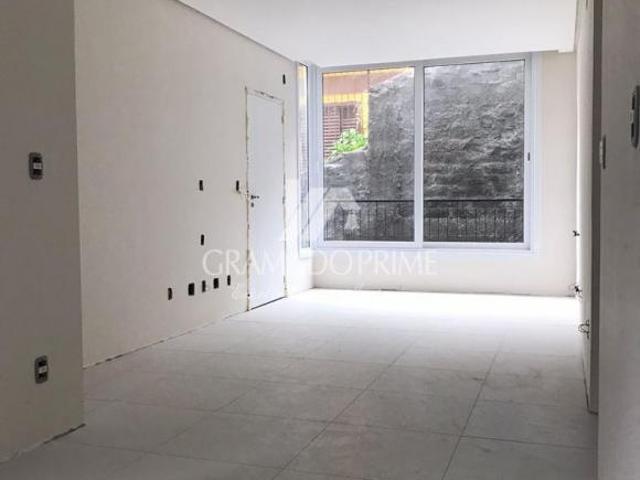 APARTAMENTO DE 2 DORMITÓRIOS GRAMADO