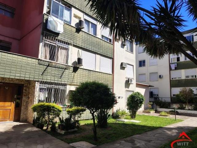 Apartamento de 2 dormitórios, living, cozinha, área de serviço e banheiro social