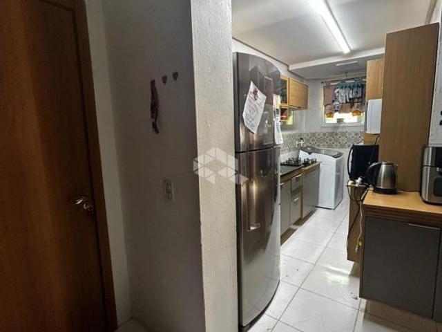 Apartamento de 2 dormitórios localizado no condomínio Ilse Scheffer em Canela