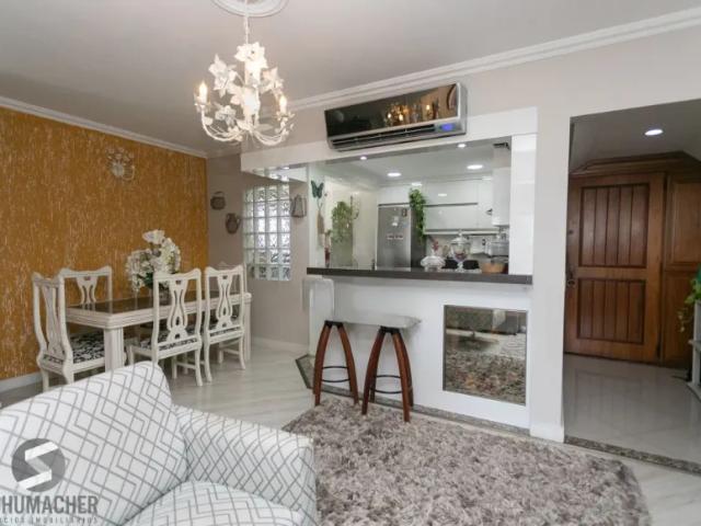 Apartamento de 2 dormitórios, suite, elevador, vaga no bairro Cristo Redentor