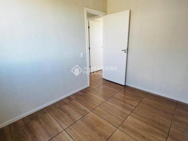 Apartamento de 2 dormitórios, sala, cozinha, banheiro social e 1 vaga de garagem