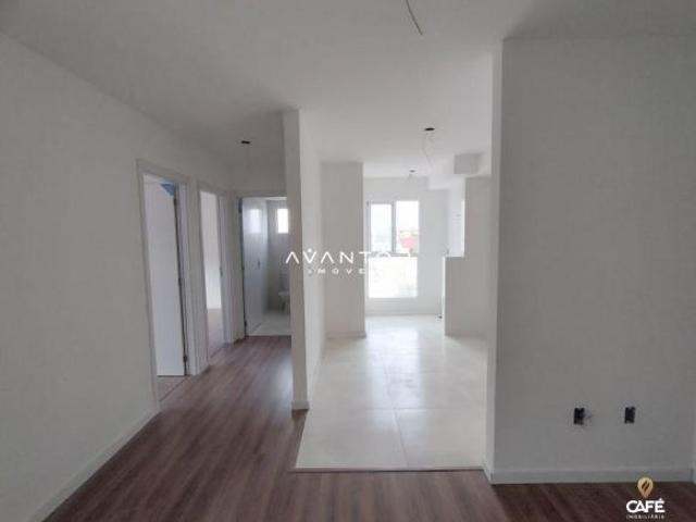Apartamento de 2 dormitórios, sala de estar, sacada e churrasqueira no bairro Ca