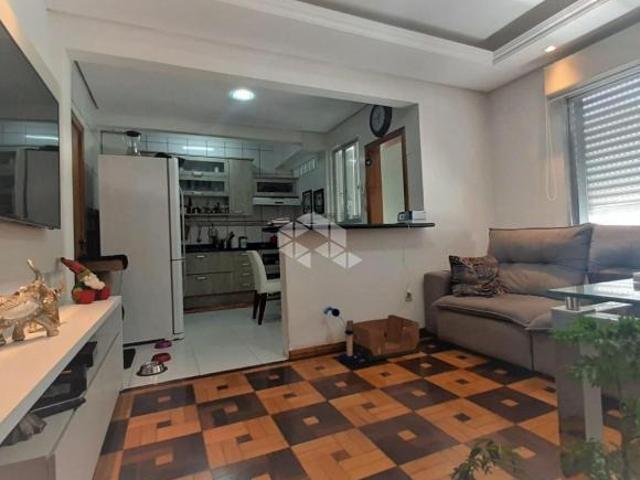 Apartamento de 2 dormitórios, semimobiliado no Centro Histórico