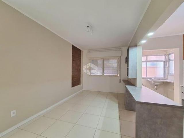 Apartamento de 2 dormitórios sendo 1 suíte com box/vaga de garagem em Capão da Canoa