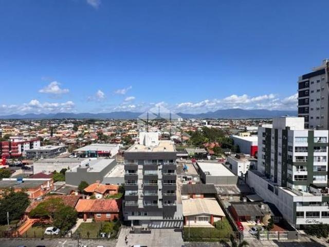Apartamento de 2 dormitórios sendo 1 suíte com churrasqueira e vaga de garagem em Capão da Canoa!