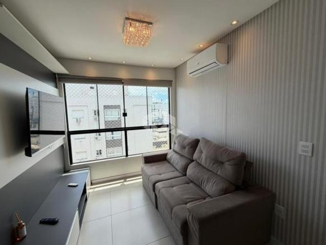 Apartamento de 2 dormitórios sendo 1 suíte mobiliado com vaga de garagem em Capão da Canoa!