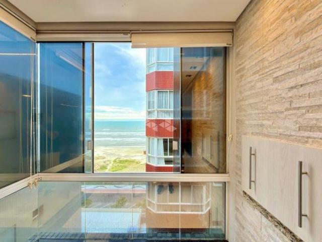 Apartamento de 2 dormitórios sendo 1 suíte mobiliado com Vista Mar no bairro Navegantes em Capão da