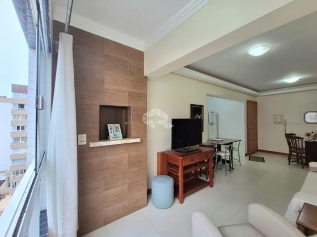 Apartamento de 2 dormitórios sendo 1 suíte mobiliado com box/vaga de garagem em Capão da Canoa