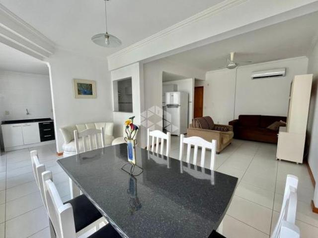 Apartamento de 2 dormitórios sendo 1 suíte mobiliado com box/vaga de garagem em Capão da Canoa