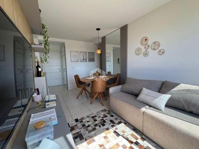Apartamento de 2 dormitórios sendo 1 suíte mobiliado com box/vaga de garagem na Zona Nova de Capão d