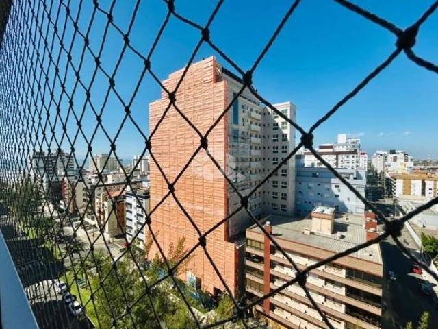 Apartamento de 2 dormitórios sendo 1 suíte mobiliado com sacada, churrasqueira e vaga de garagem em