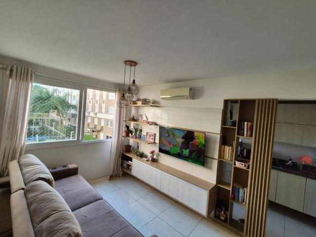 Apartamento de 2 dormitórios sendo 1 suíte no bairro Marechal Rondon em Canoas RS