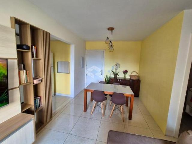 Apartamento de 2 dormitórios sendo 1 suíte no bairro Marechal Rondon em Canoas RS