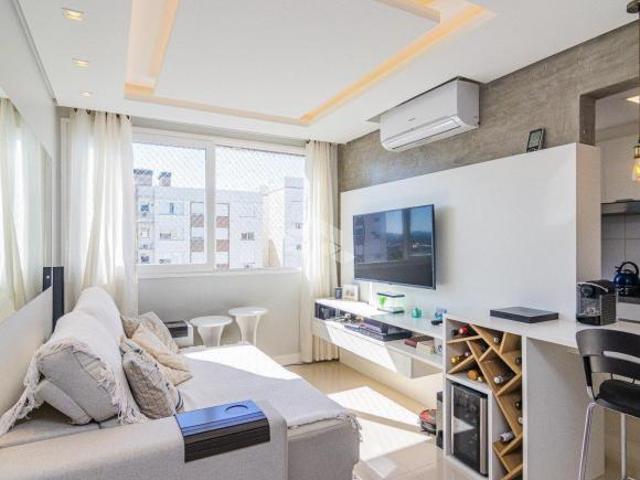 Apartamento de 2 dormitórios sendo 1 suíte no bairro Marechal Rondon em Canoas RS