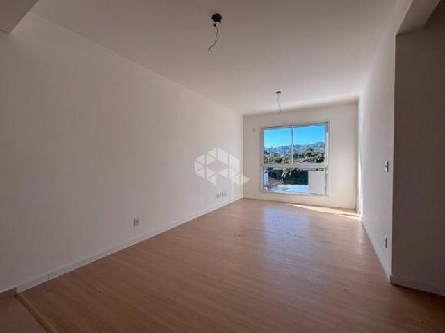 Apartamento de 2 dormitórios, sendo 1 suíte, próximo à UNISC