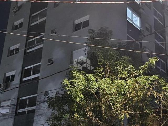 Apartamento de 2 dormitórios, uma suíte,sala, cozinha,garagem,elevador