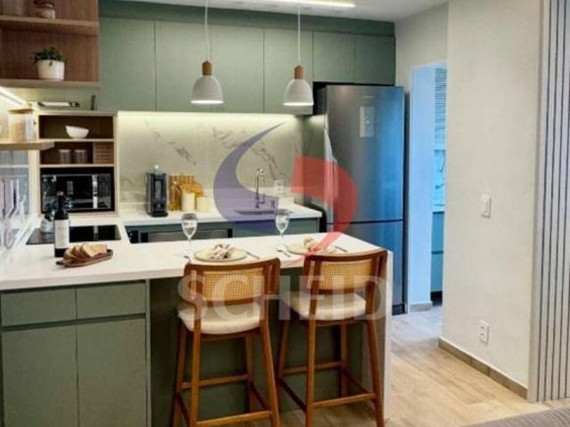 Apartamento de 2 dormitórios 1 suíte, 2 vagas, mobiliado e com belo projeto arquitetônico