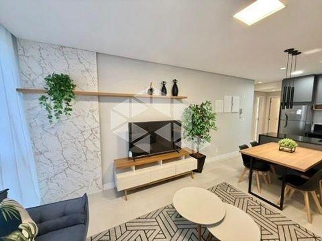 Apartamento de 2 dormitórios 1 suíte mobiliado e decorado c/box vaga de garagem no bairro Navegant