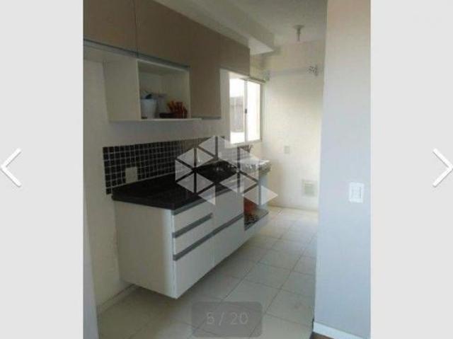 Apartamento de 2 dormitórios,1 vaga, semi mobiliado Bairro Cavalhada. Com vista zona sul