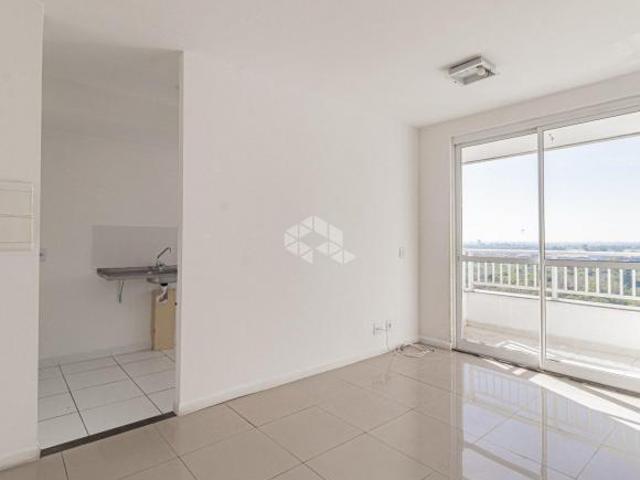Apartamento de 2 dormitórios/quartos com sacada e 1 vaga de garagem coberta no bairro Humaitá em Por
