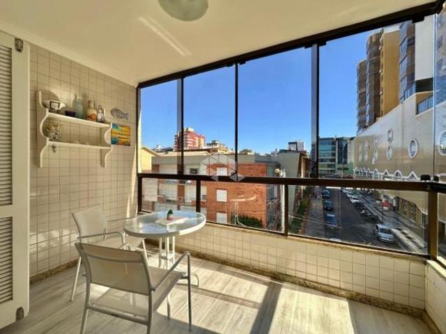 Apartamento de 2 dormitórios/quartos + dependência de empregada, sacada de frente e box/vaga de gara