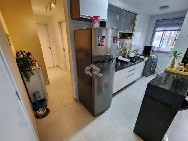 Apartamento de 2 quartos com garagem e infraestrutura no bairro Sarandi