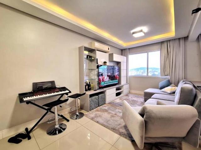 Apartamento de 2 quartos com suite e vaga de garagem no bairro Partenon