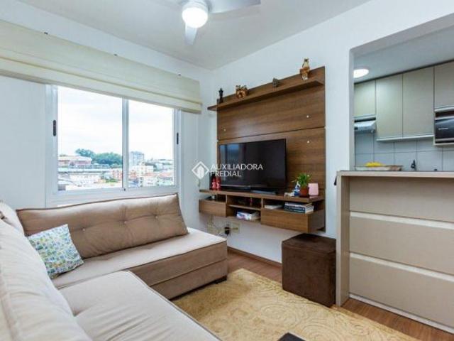 Apartamento de 2 quartos com vaga de garagem escriturada no Bairro Partenon