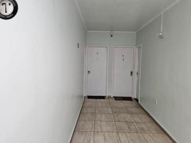 Apartamento de 2 quartos no Centro de Itanhaém SP, com 2 salas, 2 banheiros, vaga de garagem e 60m²!