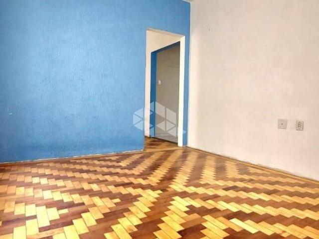 Apartamento de 2 quartos, sacada e vaga de garagem em frente ao TOTAL