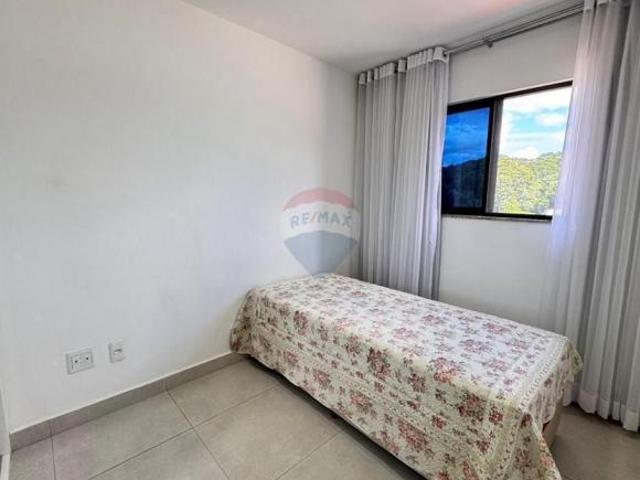 Apartamento de 2 quartos, sala com varanda e fechamento de cortina de vidro, elevador e uma vaga de