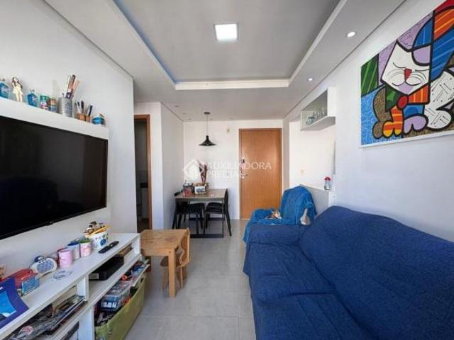 Apartamento de 2 quartos, suíte, sacada, churrasqueira, vaga escriturada à venda no bairro Morro San