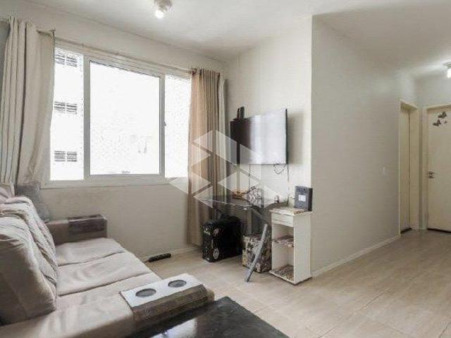 Apartamento de 2 quartos, vaga escriturada no Bairro Morro Santana