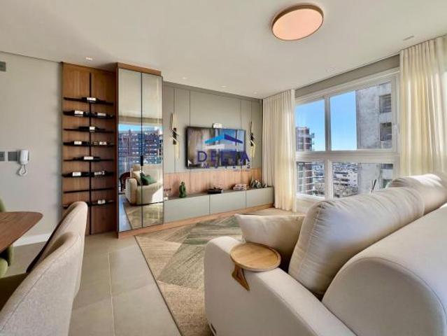 Apartamento de 2 suítes com sacada e vista mar no Predial em Torres
