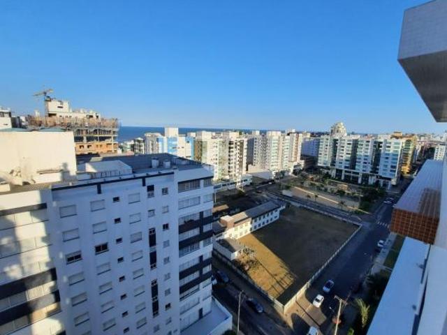 Apartamento de 2dormitórios sendo 1 suíte com box/vaga de garagem nunca habitado na Zona Nova em Cap