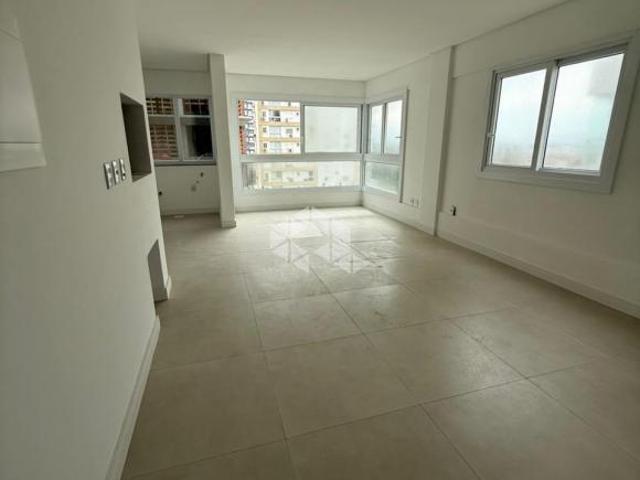 Apartamento de 3 dormtórios sendo 1 suíte com vaga de garagem em Capão da Canoa