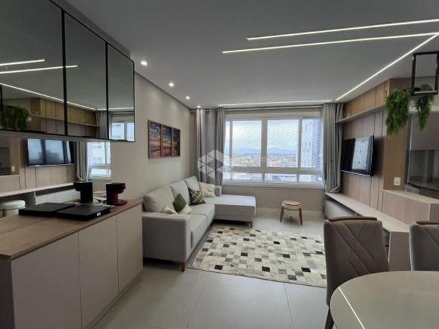 Apartamento de 3 dormitórios mobiliado e decorado com box/vaga de garagem na Zona Nova em Capão da C