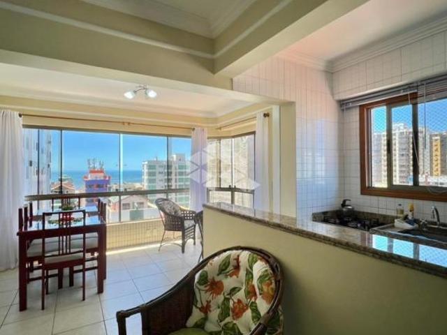 Apartamento de 3 dormitórios com vista mar mobiliado com box/vaga de garagem no