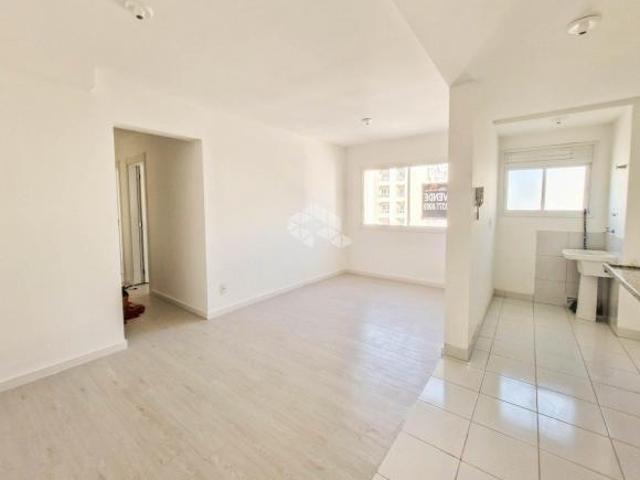 Apartamento de 3 dormitórios e 2 vagas de garagem, no bairro Humaitá, em Porto A