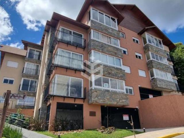 APARTAMENTO DE 3 DORMITÓRIOS EM GRAMADO