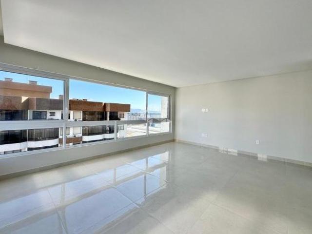 Apartamento de 3 dormitórios + lavabo e 2 box vaga de garagem novo nunca habitado no Centro de Cap