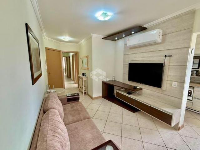 Apartamento de 3 dormitórios sendo 1 suíte mobiliado com vaga de garagem no Cent