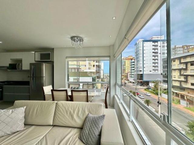 Apartamento de 3 dormitórios sendo 1 suíte mobiliado com box/vaga de garagem em Capão da Canoa