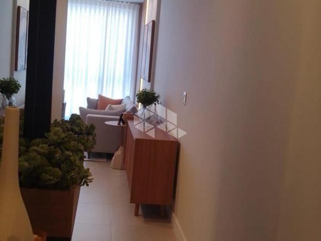 Apartamento de 3 dormitórios 1 suíte mobiliado com box/vaga de garagem na Zona Nova em Capão da Cano