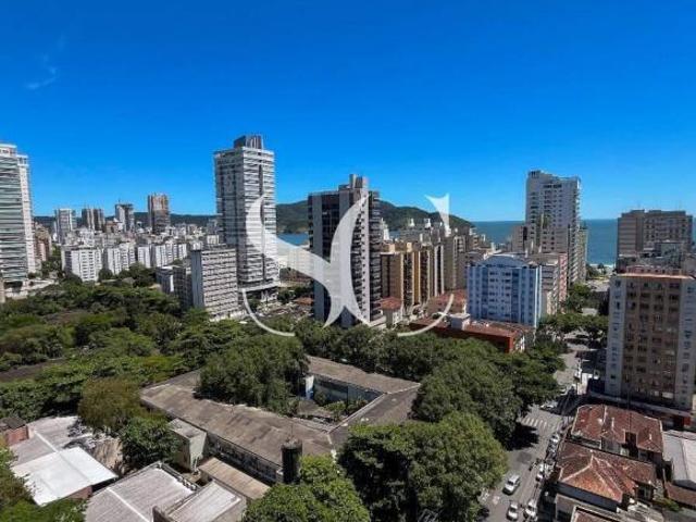 Apartamento de 3 quartos com 2 suítes, varanda, sala 3 ambientes vista mar em Santos Aparecida